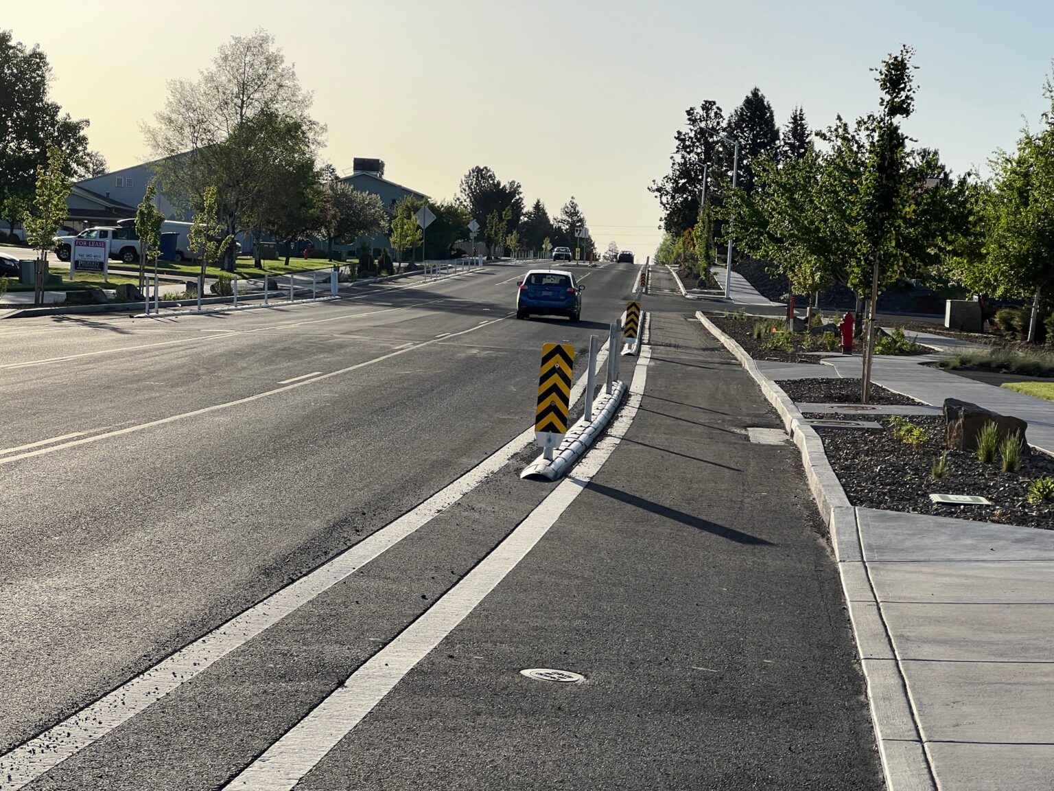 Bollard protected bike lanes - Bend Bikes